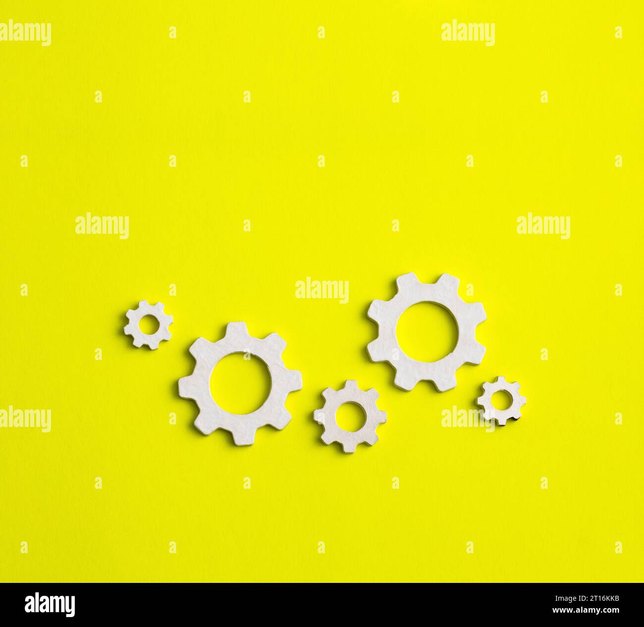 Business process and workflow automation - Gears on yellow background ...
