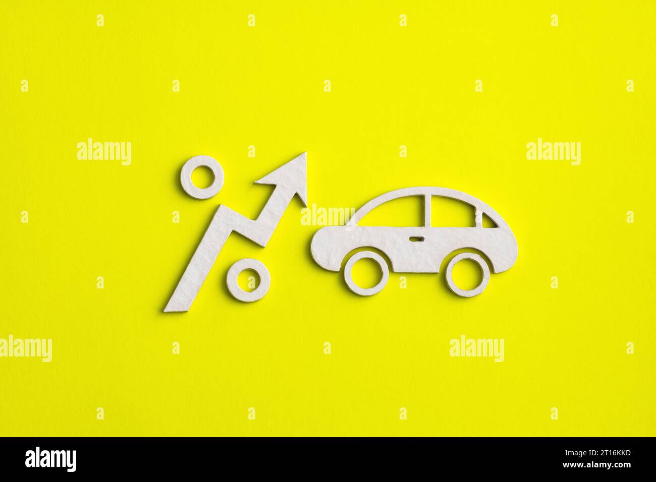 Car value increase - Arrow on yellow background Stock Photo - Alamy