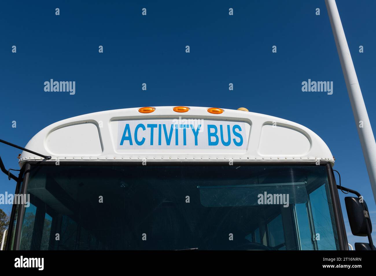 Close-up view of an activity bus or school activity with lights and a ...