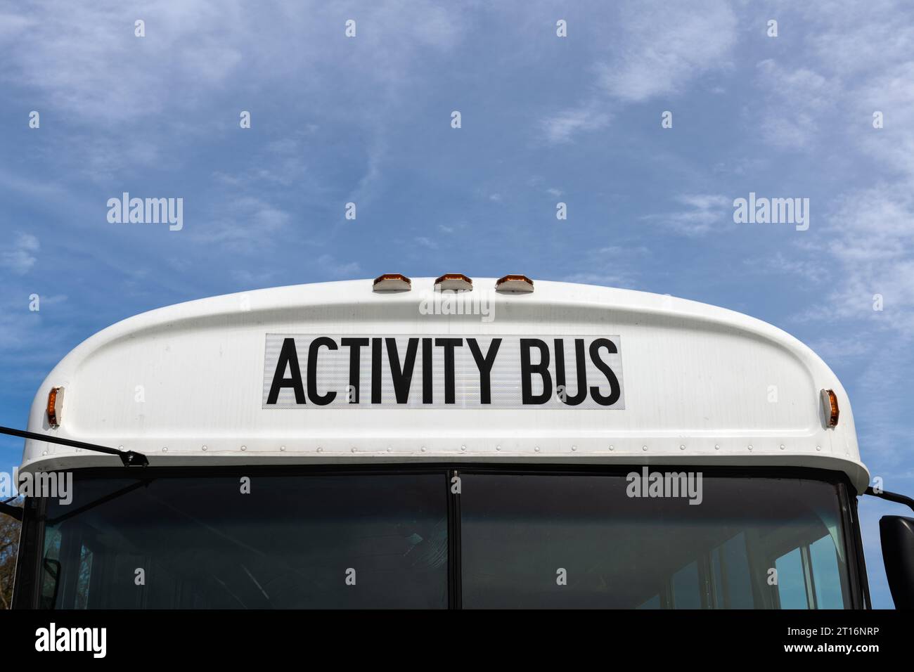 Close-up view of an activity bus or school activity with lights and a ...