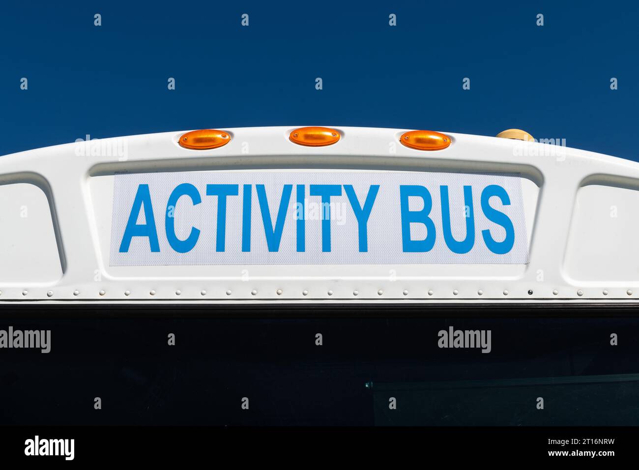 Close-up view of an activity bus or school activity with lights and a ...