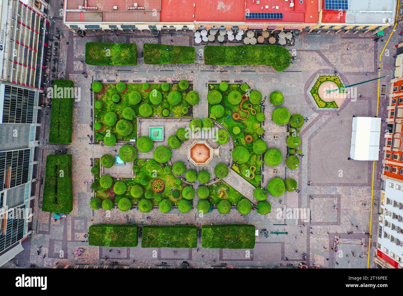 Kiosk and trees in the main garden in the historic center of León ...