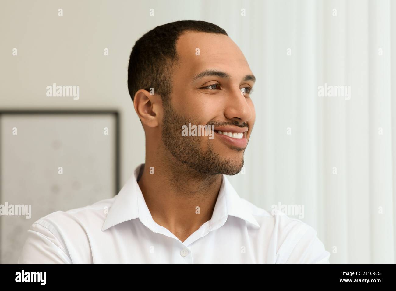 Handsome young man in white hi-res stock photography and images - Alamy
