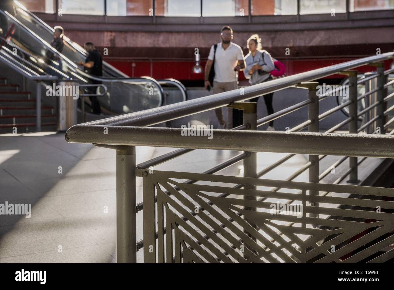 Access between railings and people to the metro and train stations from ...