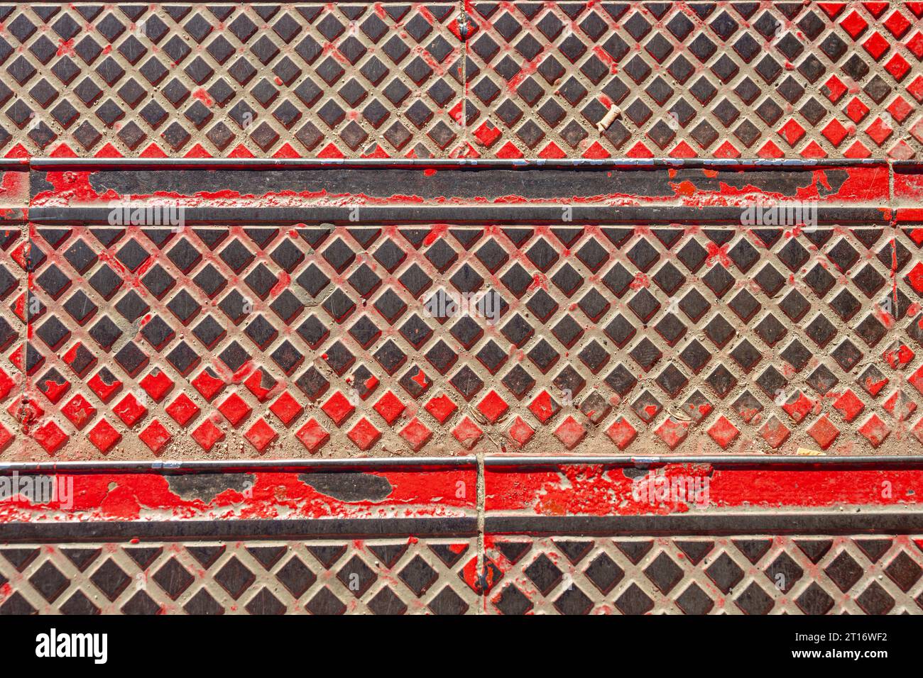 Metal stair treads with peeling red paint. metal texture background ...