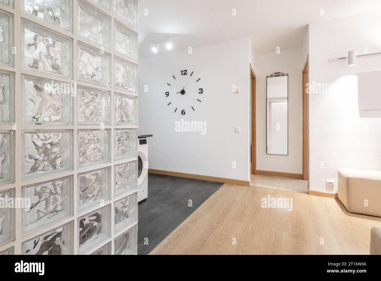 Hall of an apartment with a glass pave partition on one side Stock ...