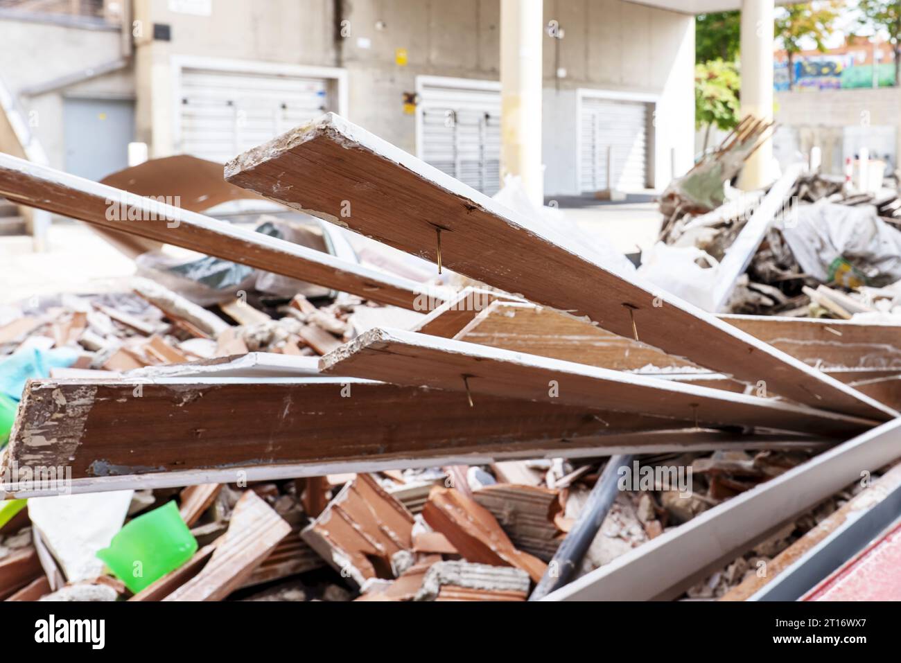 Wood and brick waste from a home renovation work deposited in a ...