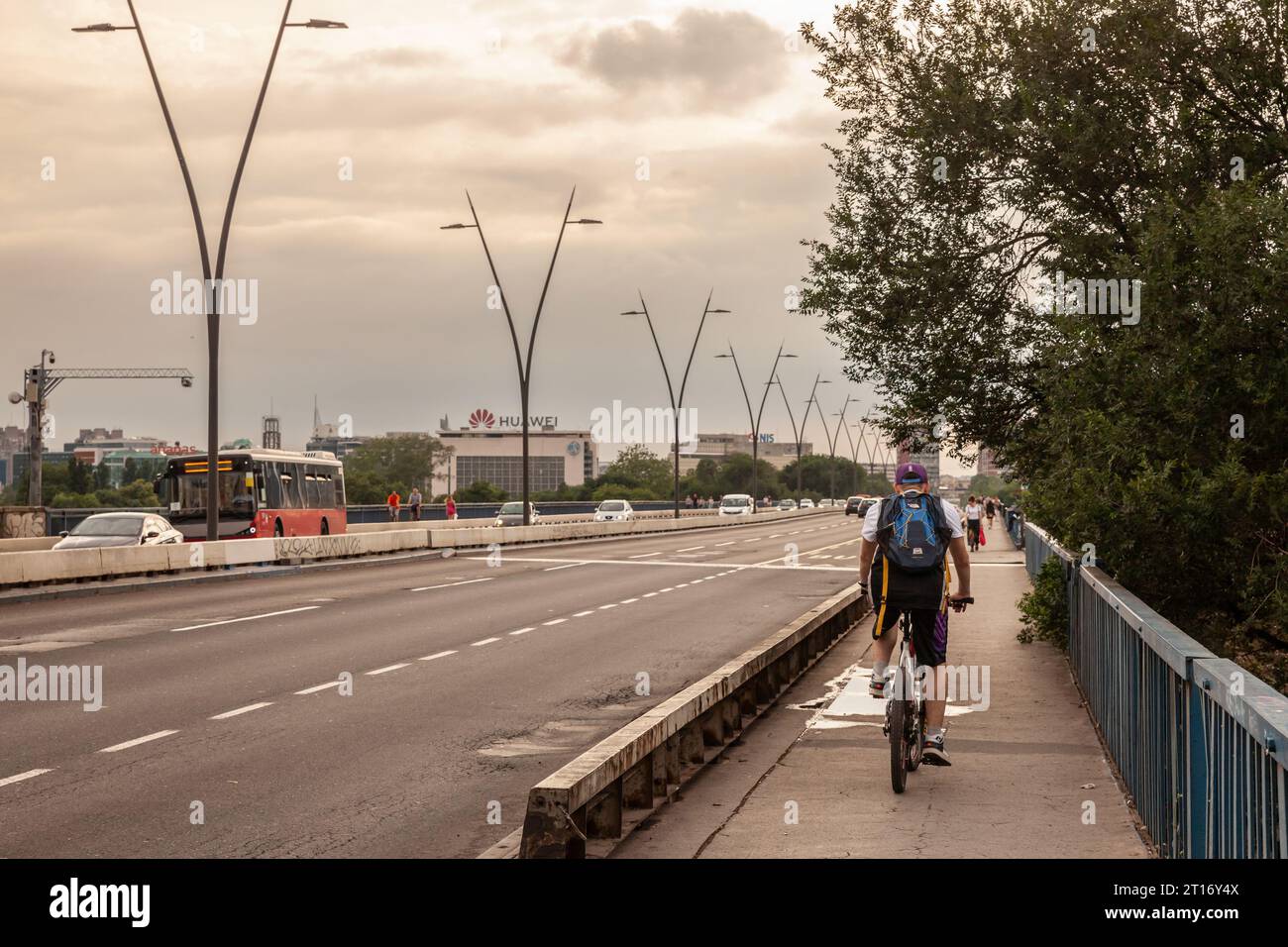 Picture of Branko's bridge during a sunny afternoon with people cycling ...