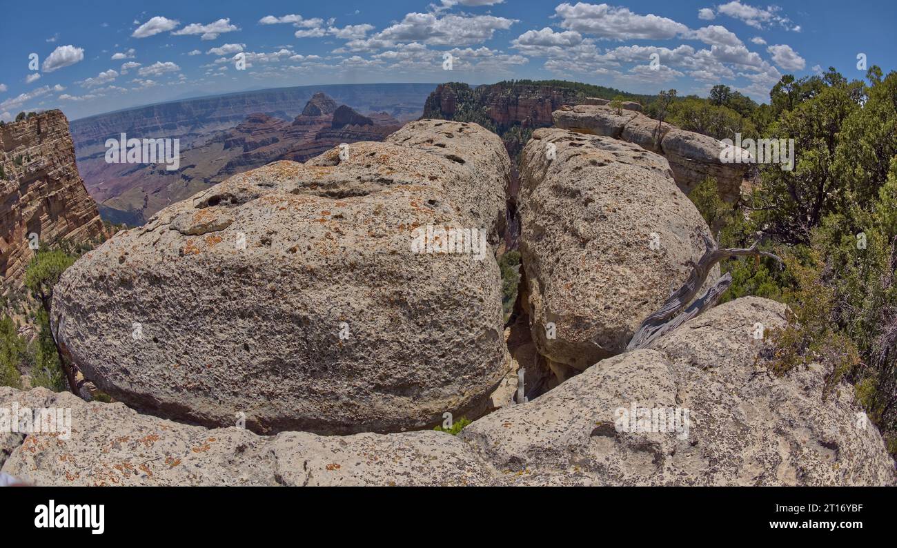 Large boulders perched on a cliff overlooking Unkar Creek near Cape ...