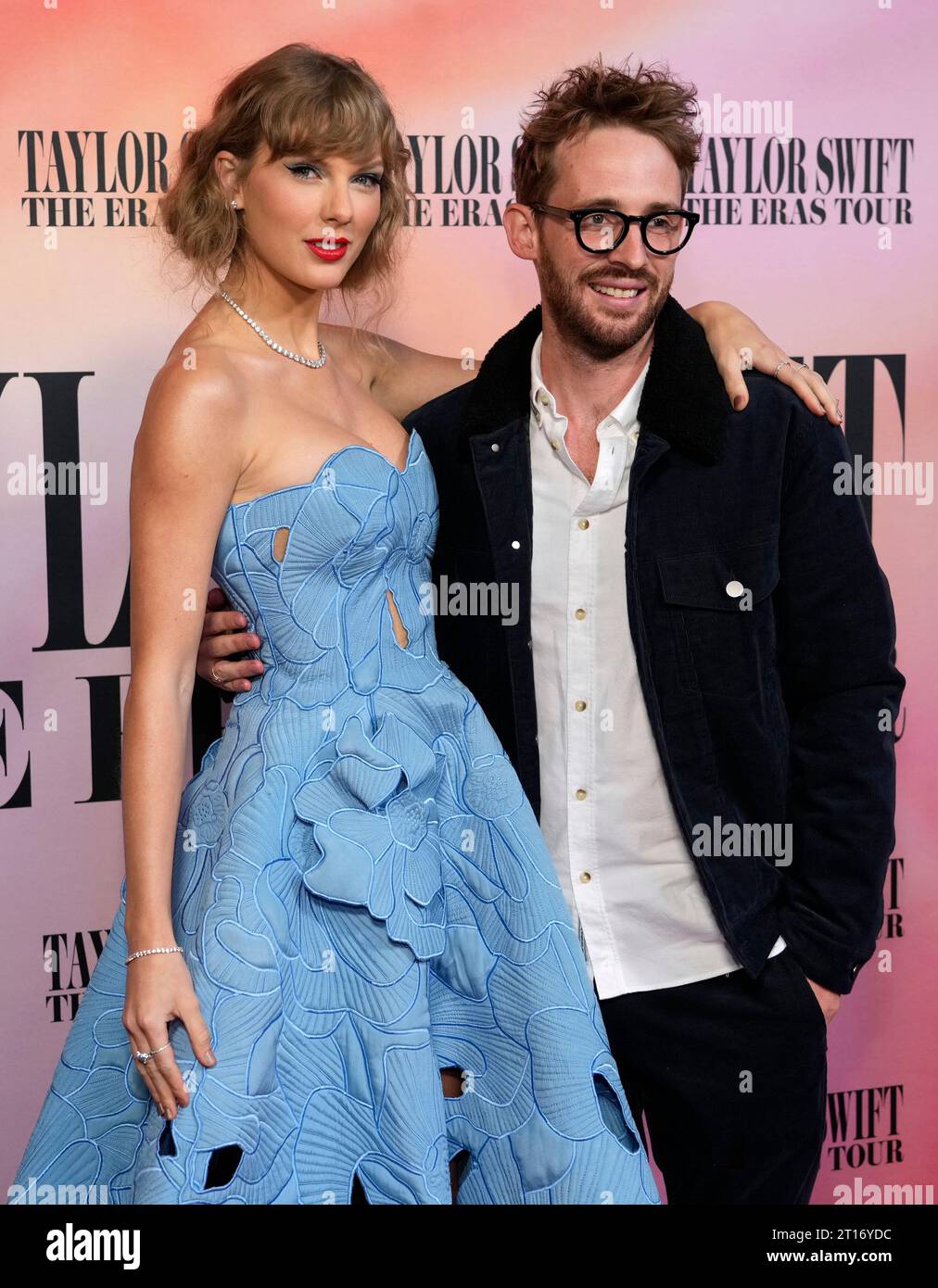 Taylor Swift, left, and director Sam Wrench arrive at the world ...