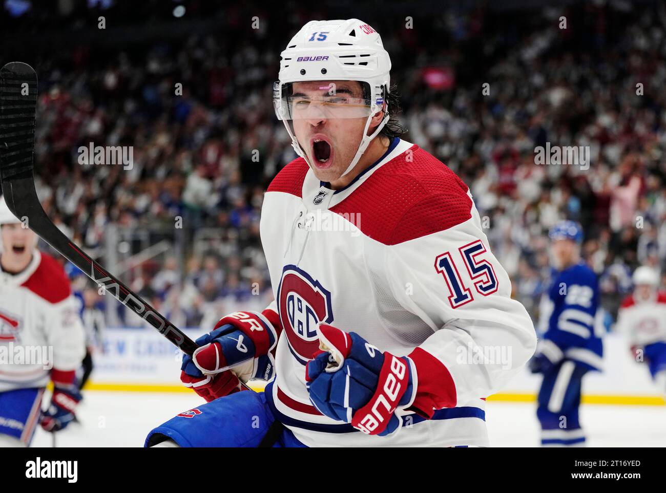 Montreal Canadiens' Alex Newhook (15) celebrates his goal against the ...
