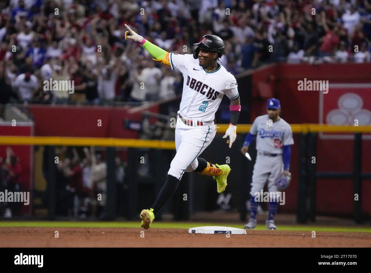 Arizona Diamondbacks' Geraldo Perdomo celebrates as he rounds the bases ...