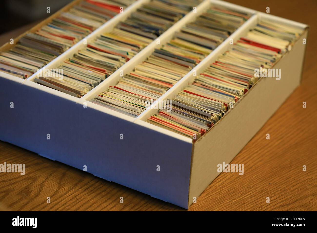 Sports card collection organized in a box Stock Photo - Alamy