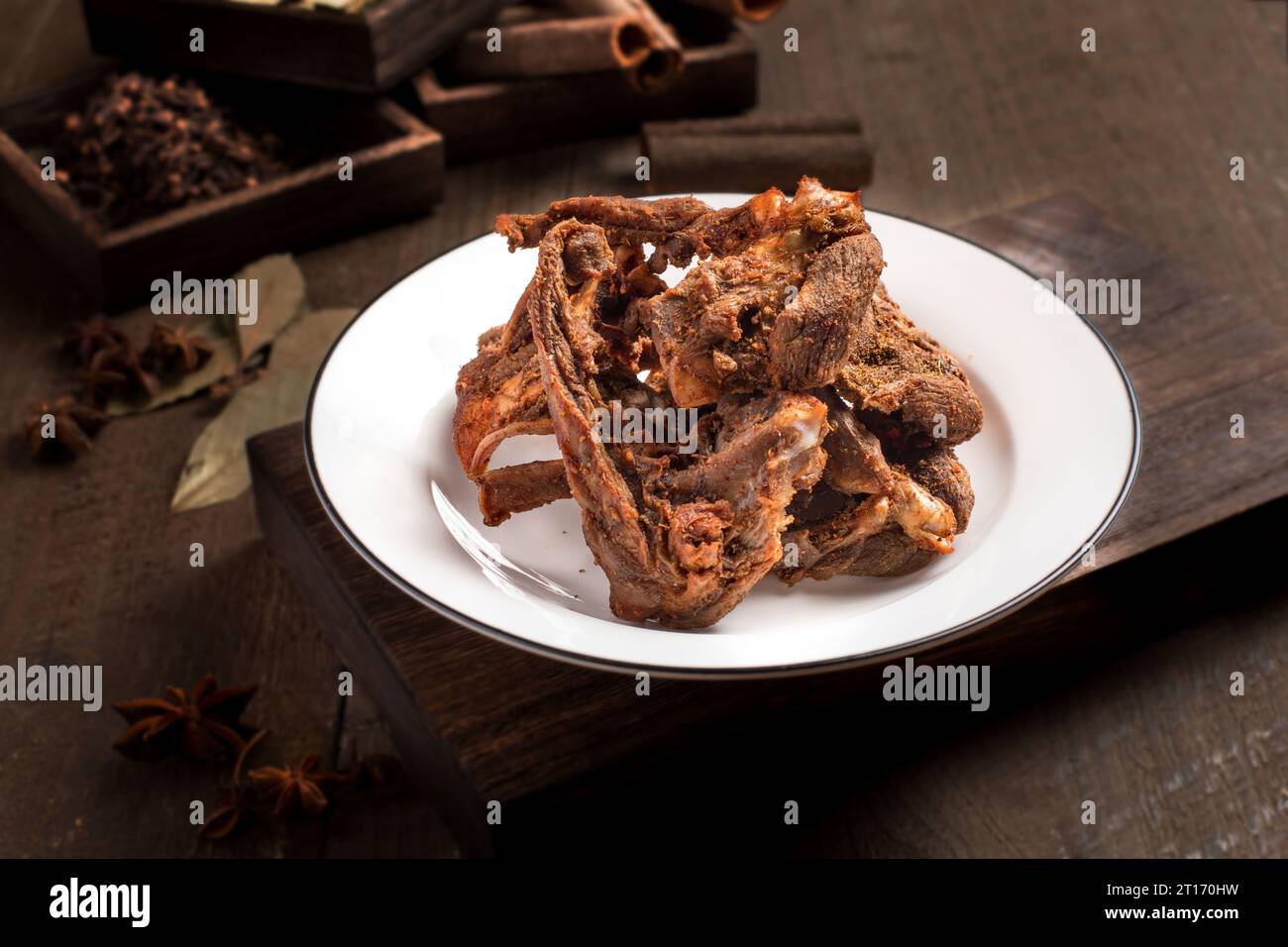 Marinated duck Clavicle bone in Spiced Sauce Stock Photo - Alamy