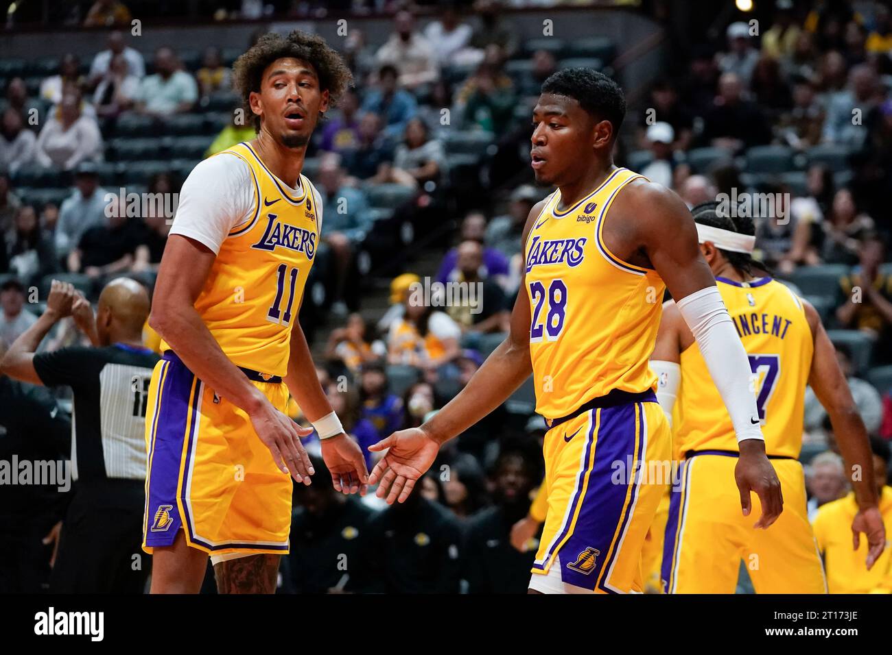 Los Angeles Lakers forward Rui Hachimura, right, and Los Angeles Lakers center Jaxson Hayes high ...