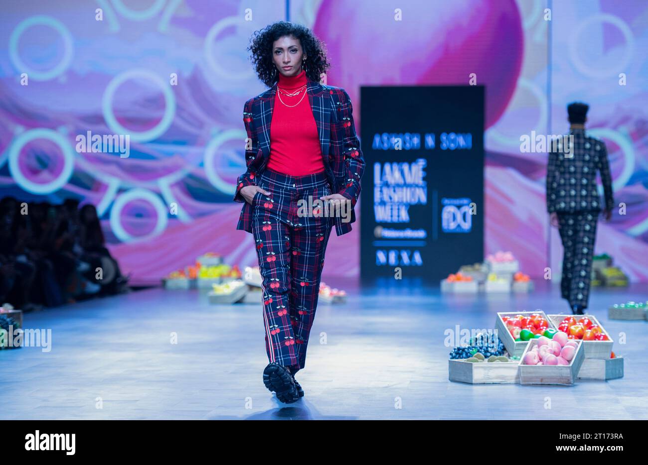 New Delhi, India. 11th Oct, 2023. A model displays a creation of Indian ...