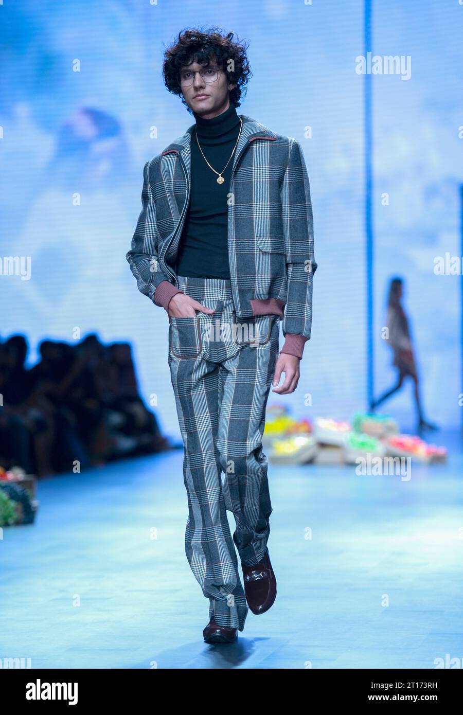 New Delhi, India. 11th Oct, 2023. A model displays a creation of Indian ...