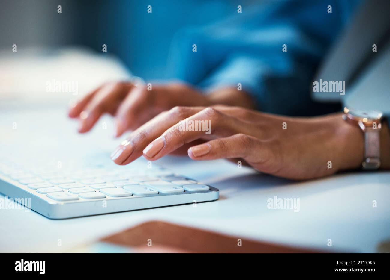 Keyboard, email marketing and hands of employee typing and working ...