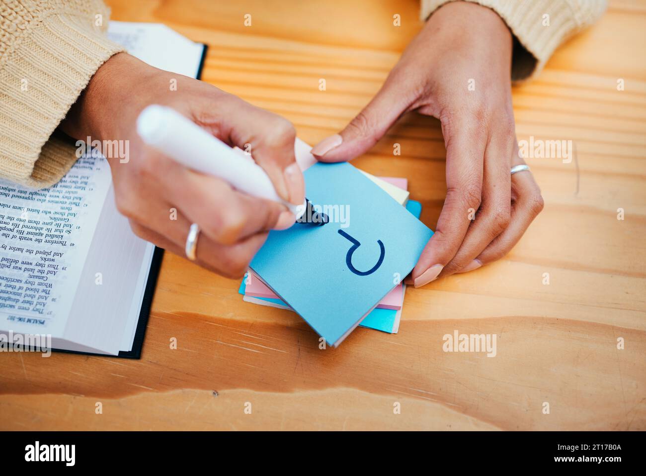 Woman, bible and question on sticky note, hands and god for worship ...