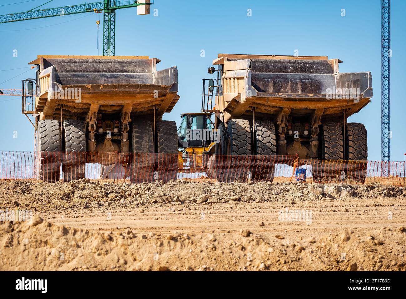 Large earthmoving trucks in new residential areas of Madrid, Spain ...