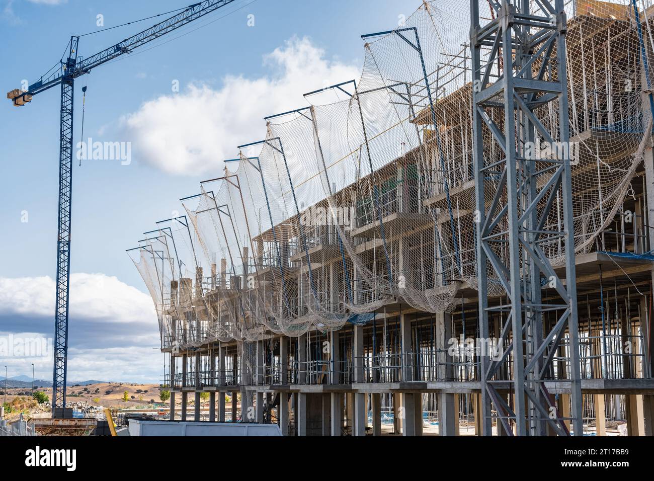 New residential buildings under construction with scaffolding and ...