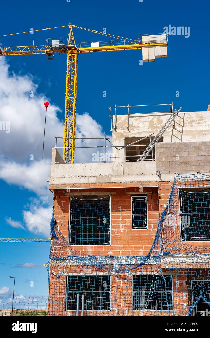 Buildings under construction with bricks and concrete in new expansion ...
