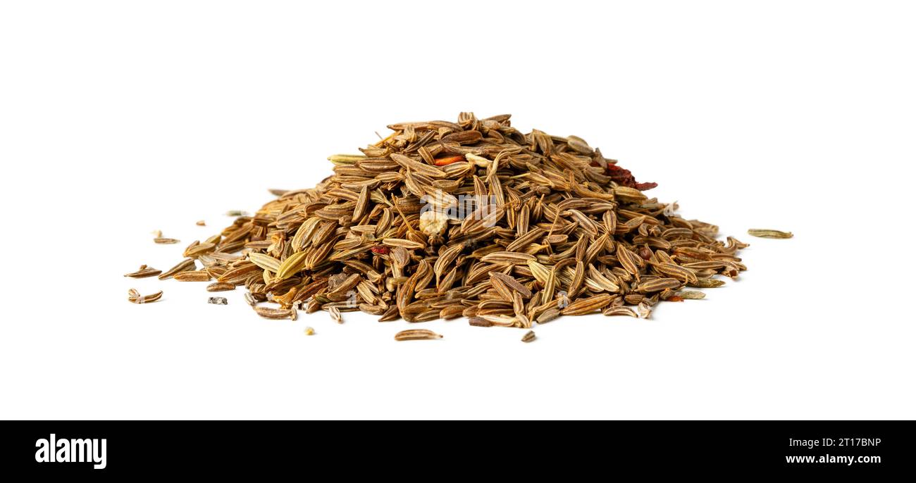 Pile of cumin seeds spice isolated on white background Stock Photo - Alamy