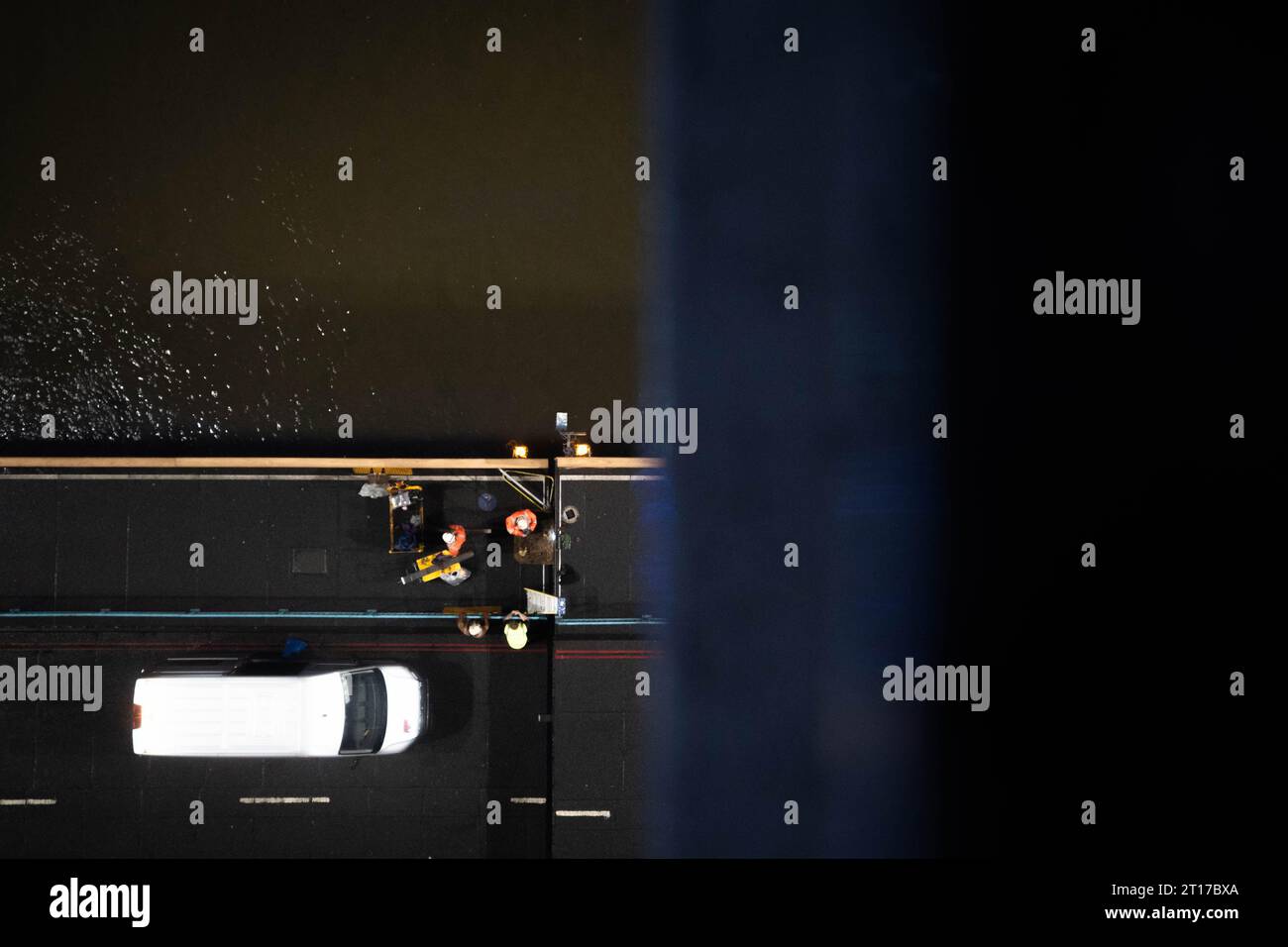 Engineers work at Tower Bridge in central London. For the first time in ...