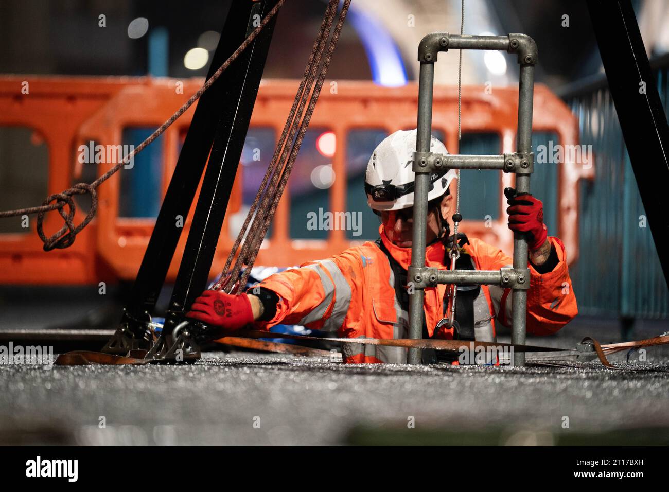 Engineers work at Tower Bridge in central London. For the first time in ...