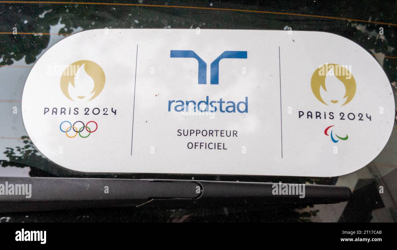 paris , France - 10 06 2023 : Randstad and paris 2024 logo brand and ...