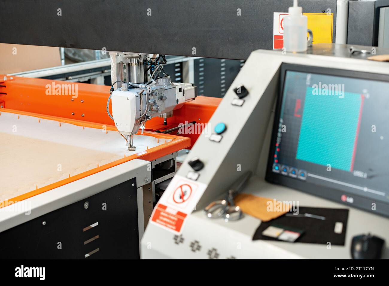 Automatic industrial sewing machine for stitching fabric Stock Photo ...