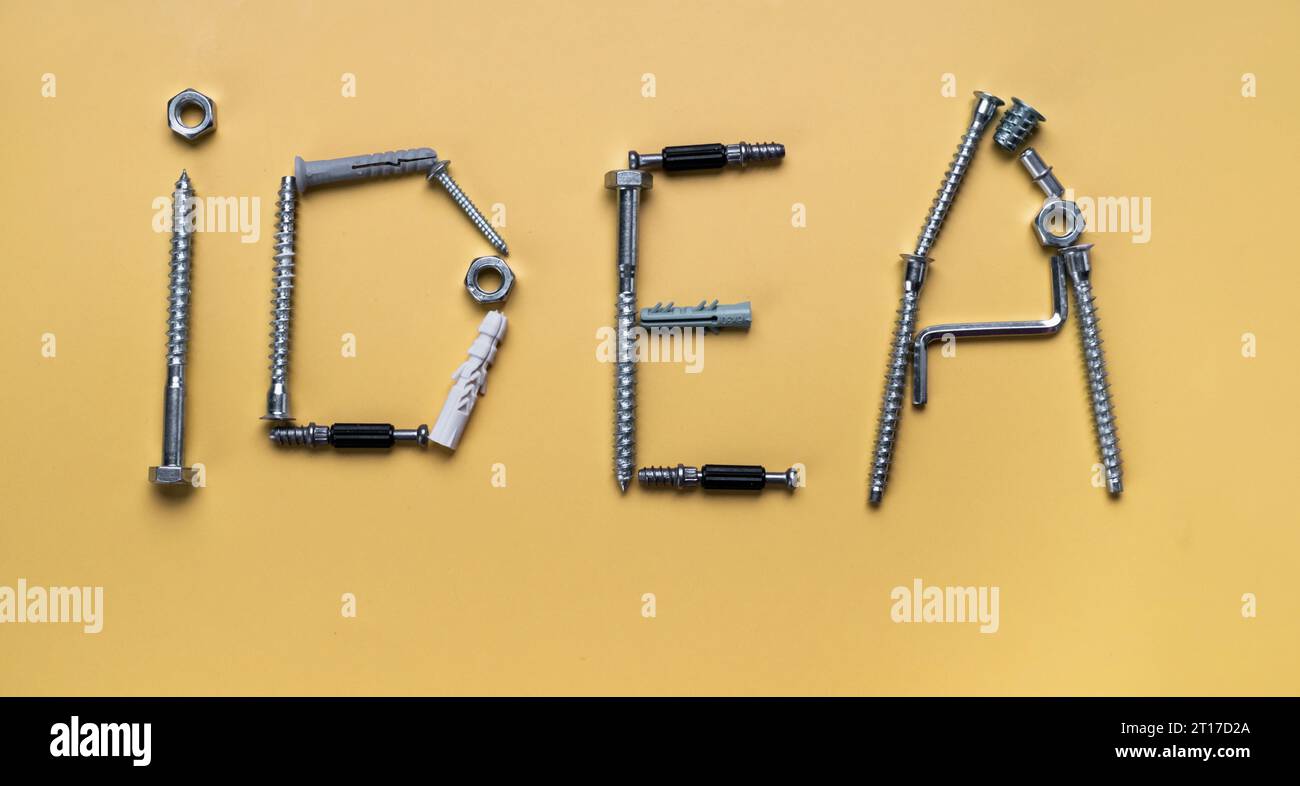 Sign Idea, frame with copy space made of bolts, screws. Banner on ...