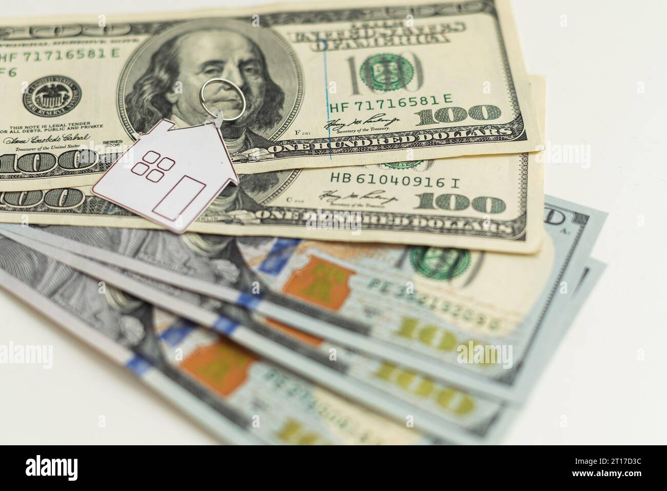 house layout and dollar bills on the background Stock Photo - Alamy