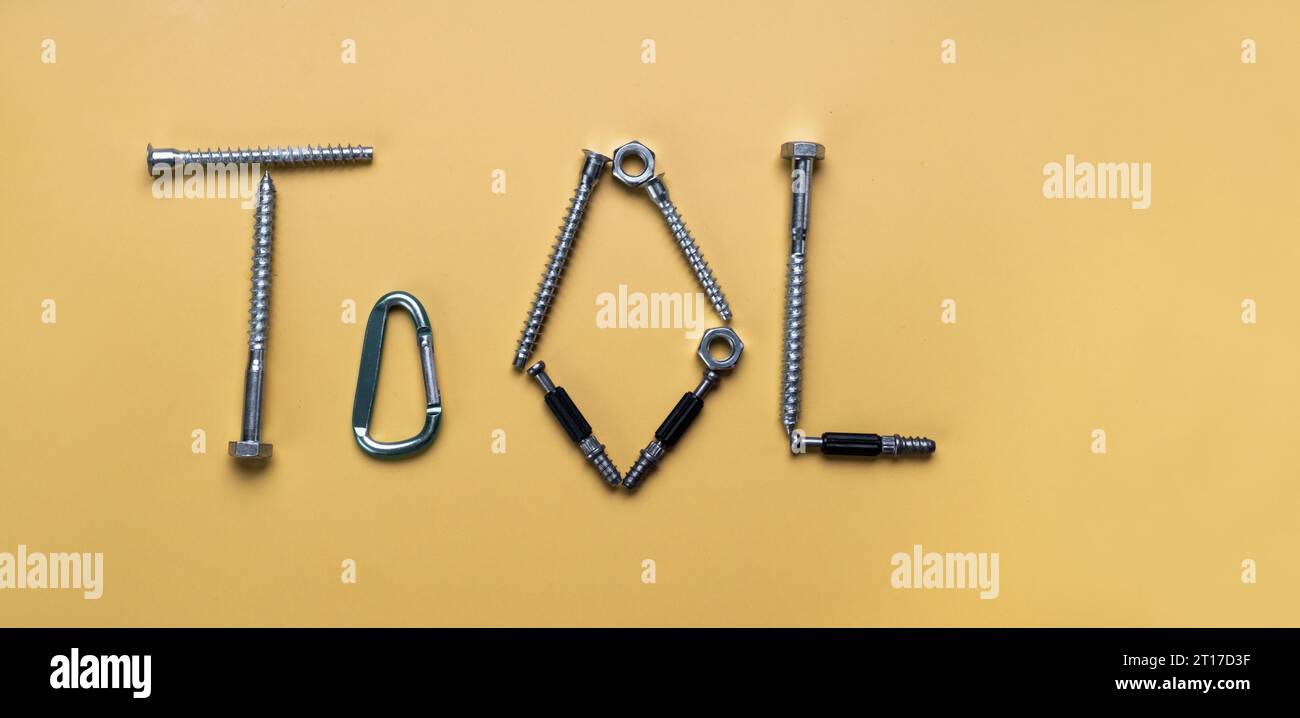 Sign Tool, frame with copy space made of bolts, screws. Banner on ...