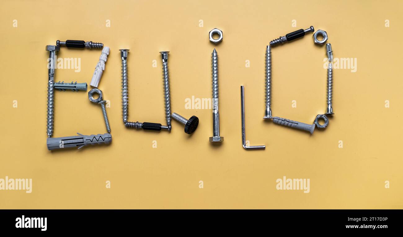 Sign Build, frame with copy space made of bolts, screws. Banner on ...