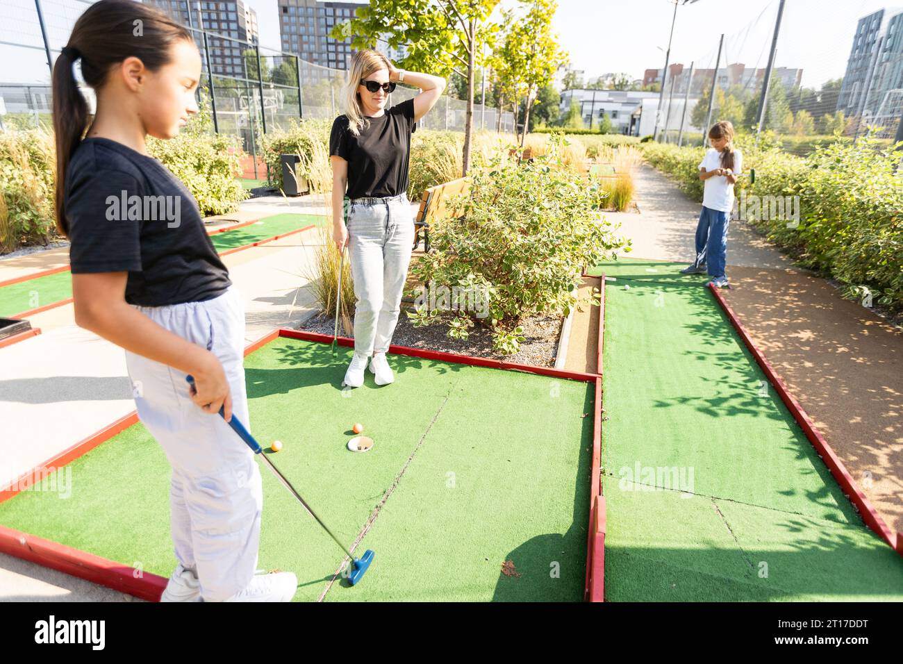 Golf course group of friends people with children posing standing Stock ...