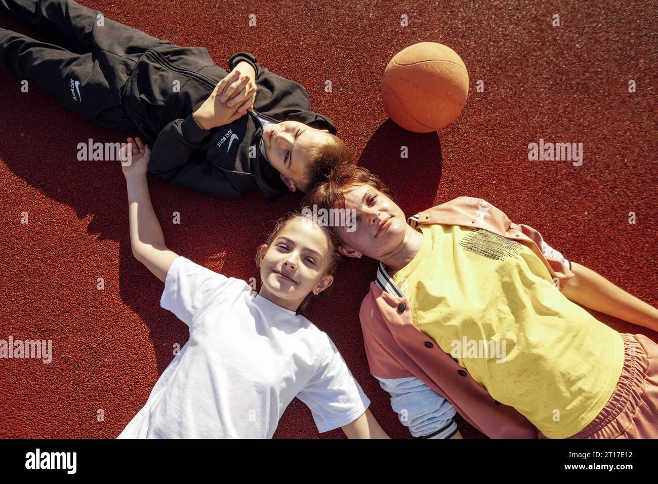 Laid-back Laughter: Unwinding with Children on the Basketball Court ...