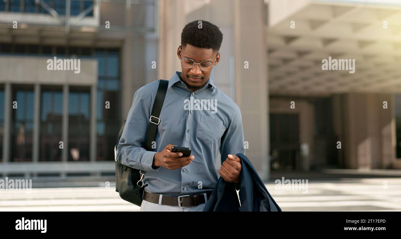 Man, walking and texting from work, corporate clothes and wondering in ...