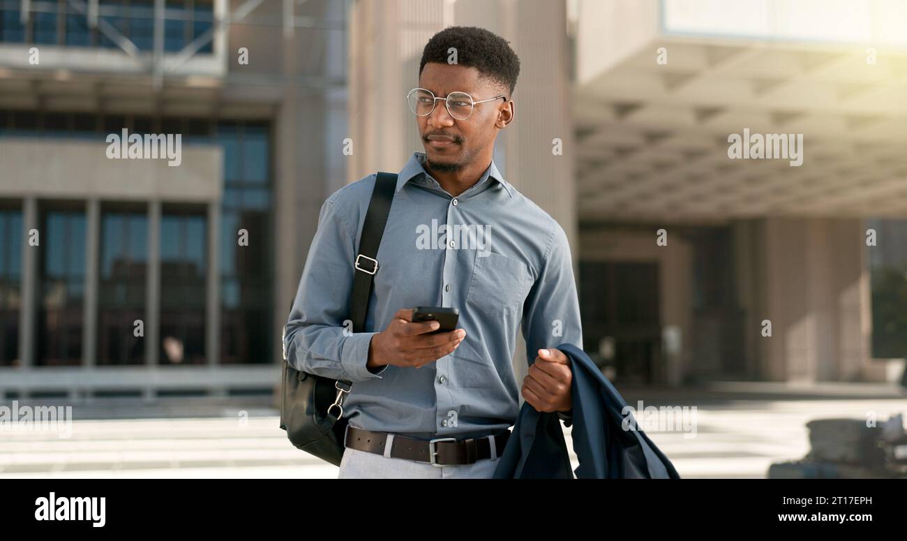 Man, walking and texting from work, corporate clothes and wondering in ...