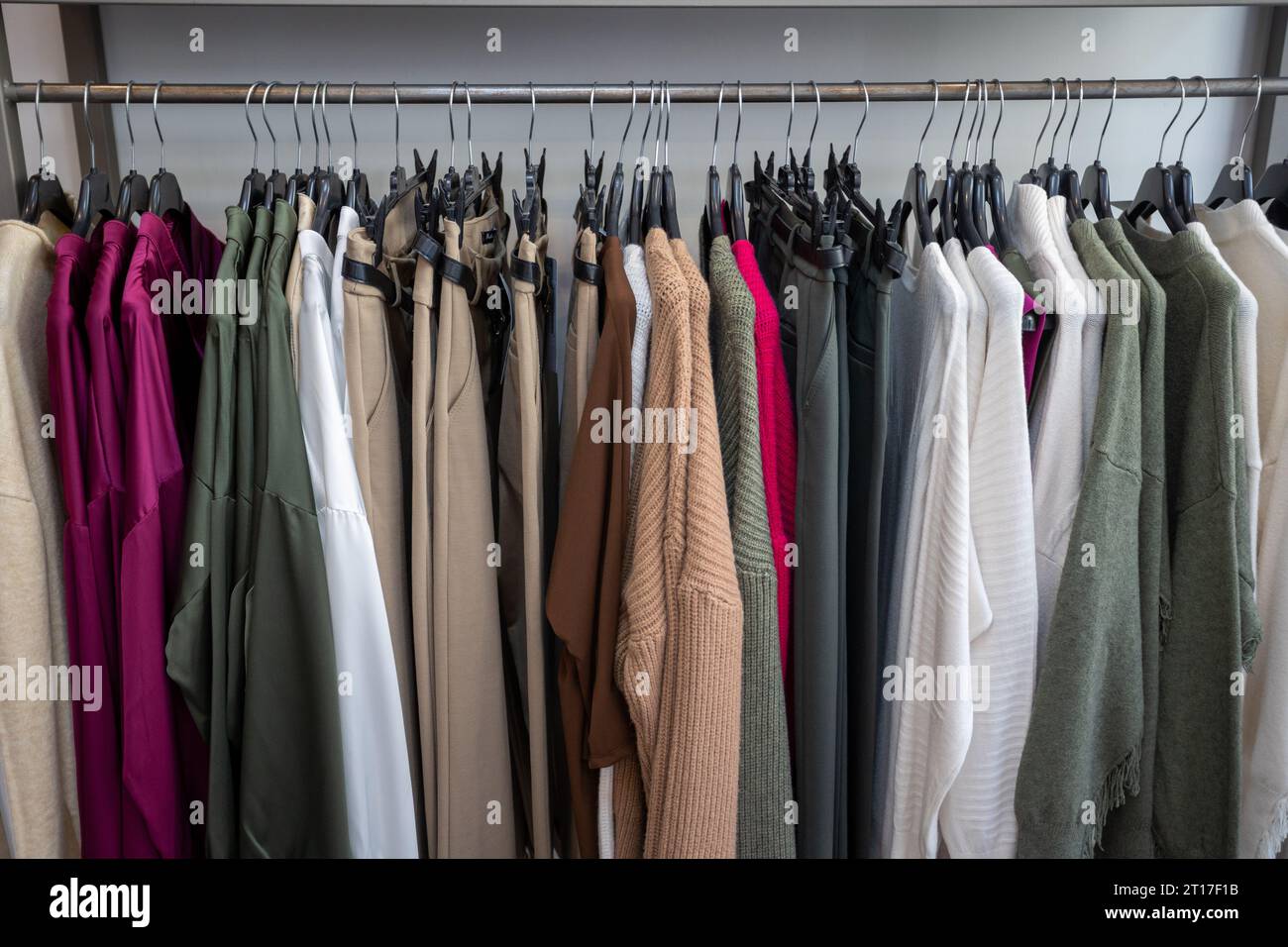 clothes on sale in a ready-to-wear store Stock Photo - Alamy