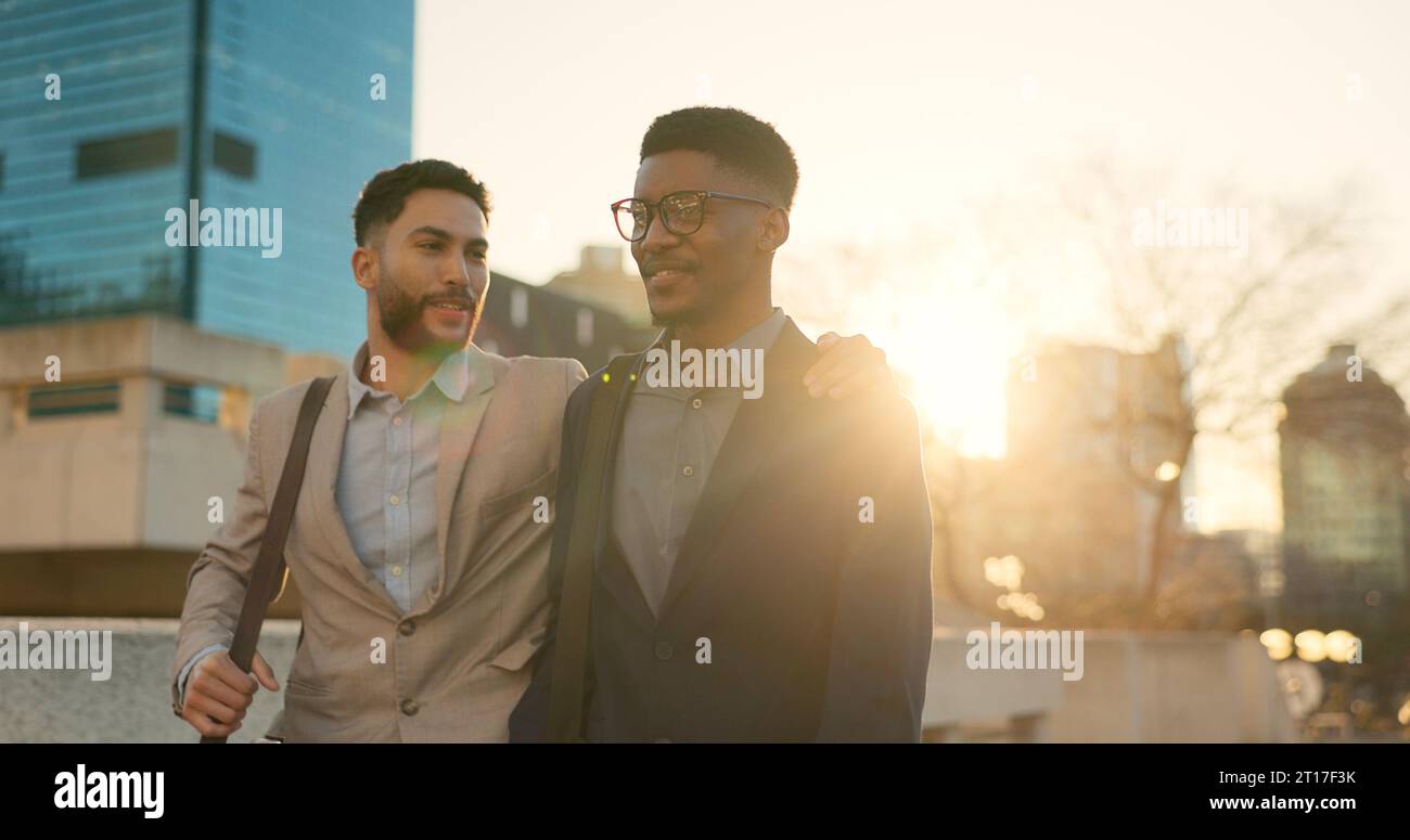 City, men and walking with business people, hug and lens flare with ...