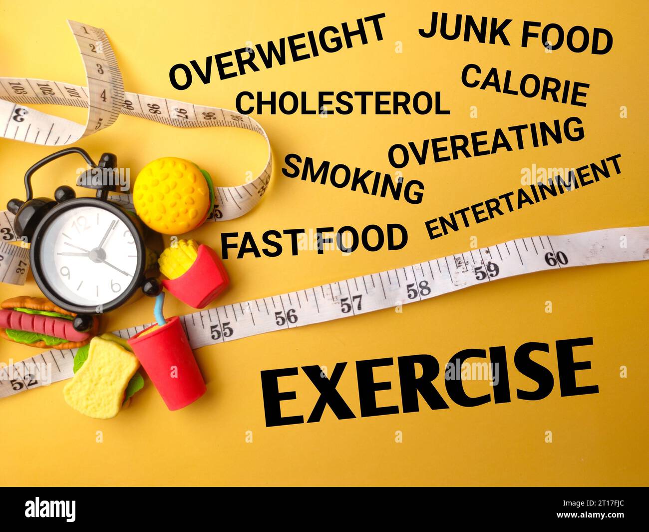 Clock and measuring tape with unhealthy lifestyle practices and an ...