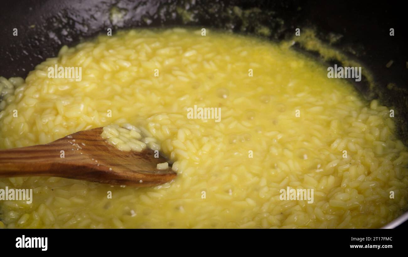 cooking saffron rice Stock Photo - Alamy