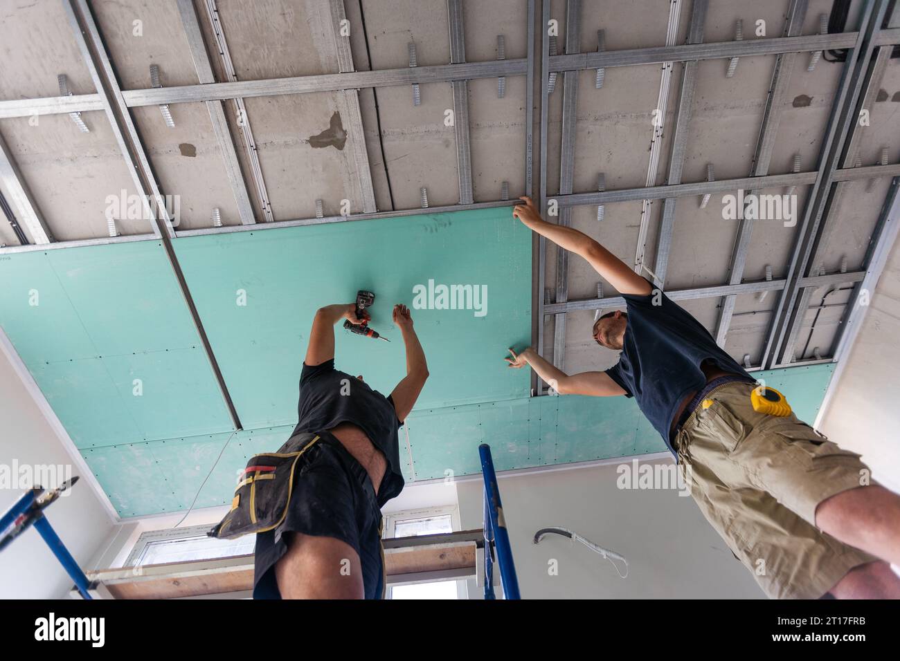 Man fitting ceiling panel hi-res stock photography and images - Alamy