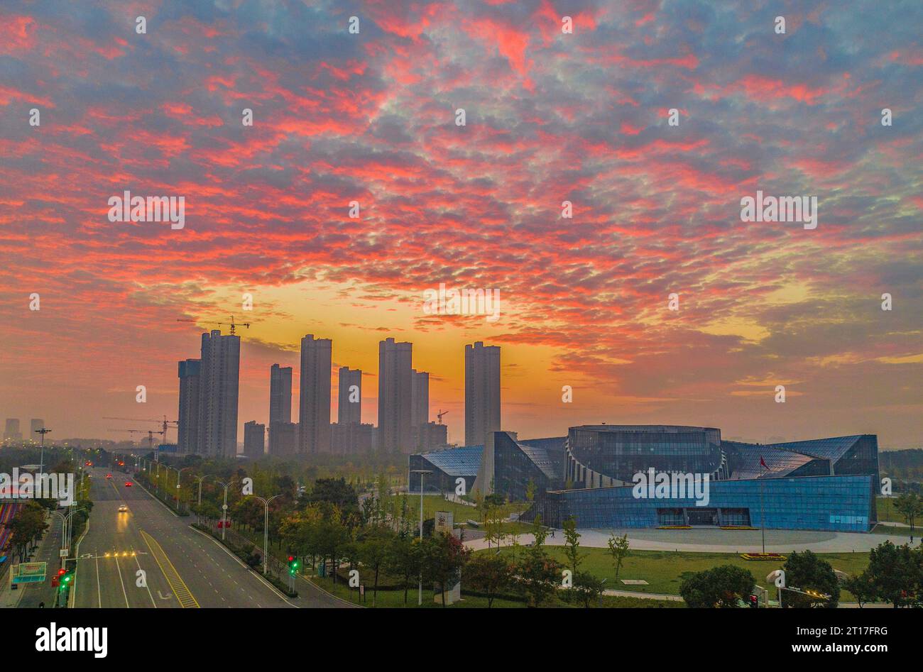 Suqian, China. 12th Oct, 2023. Buildings under construction are seen ...