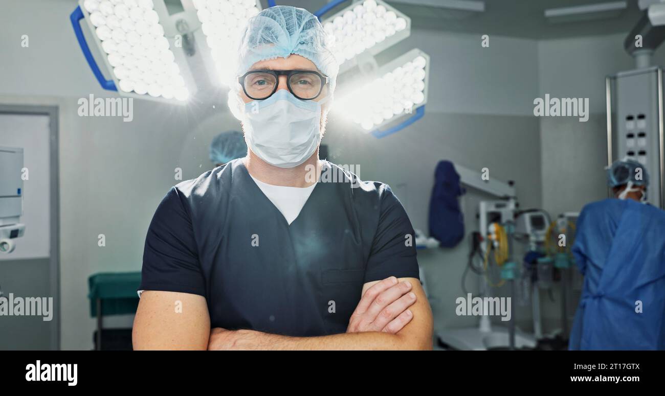 Surgeon, doctor and man in portrait with arms crossed, healthcare and ...
