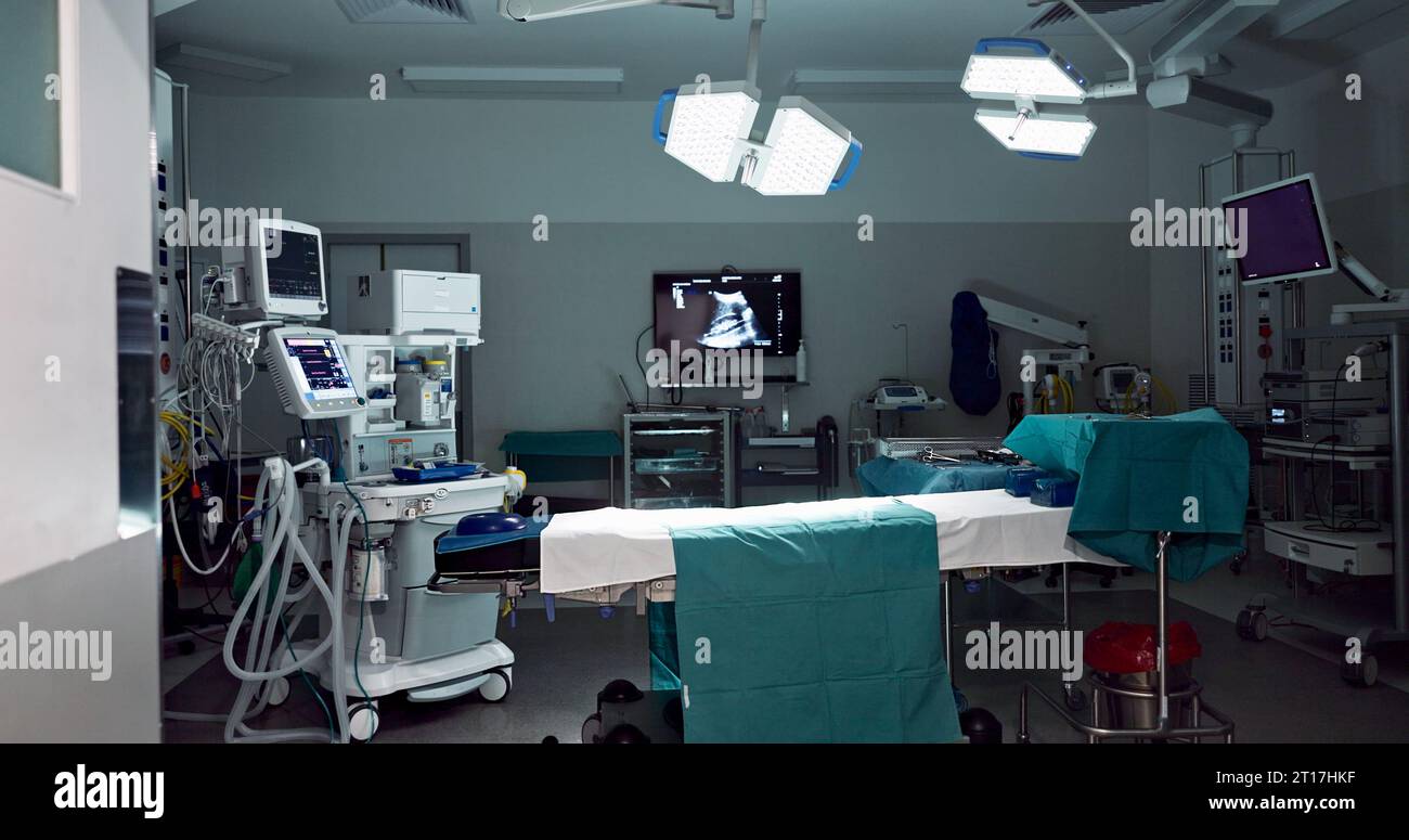 Empty, dark hospital and room for operation, emergency service and ...
