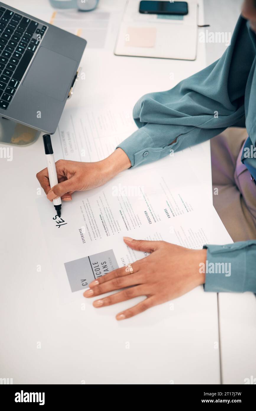 Hands, pen and human resources writing on CV, hiring and recruitment ...