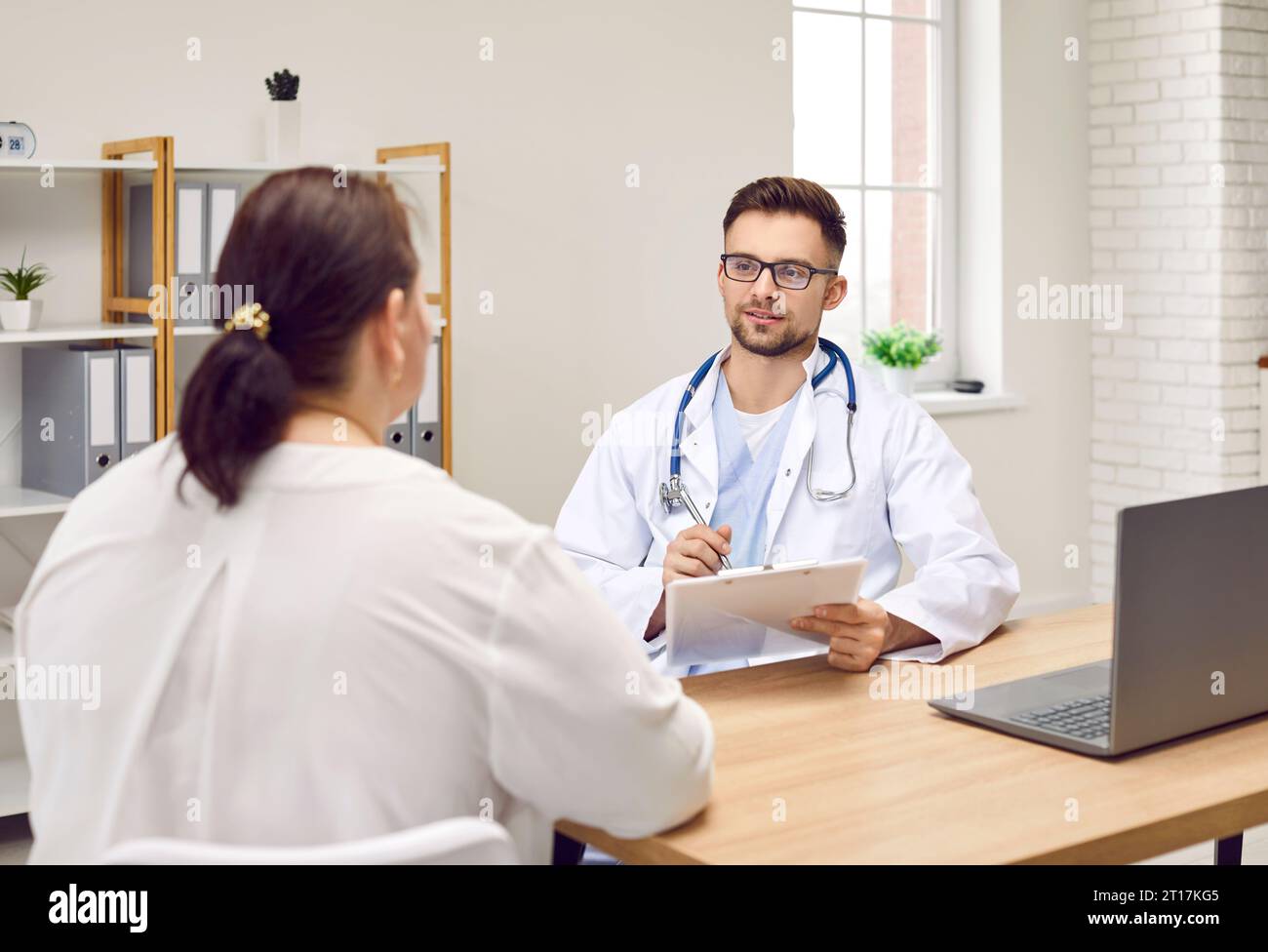 Doctor obese patient talking hi-res stock photography and images - Alamy