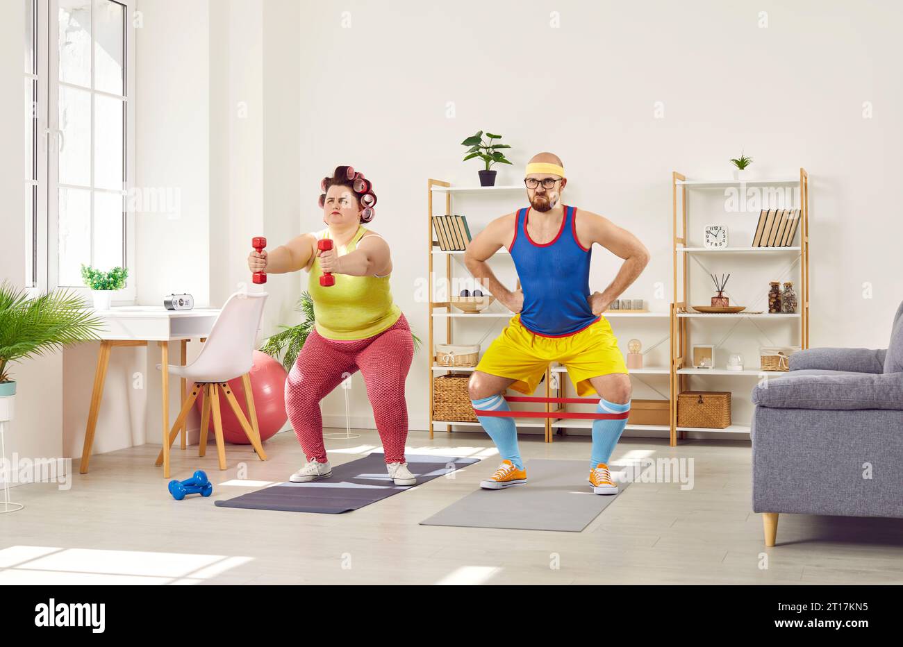 Funny fat woman and her fit sports trainer having active fitness ...